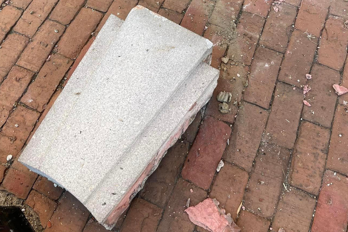 Hallowell sidewalk closed after granite block falls from building